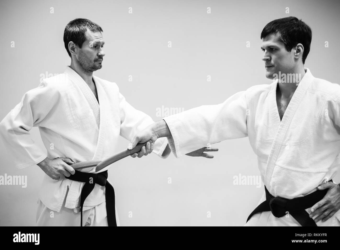 Fight between two aikido fighters in sport Stock Photo - Alamy
