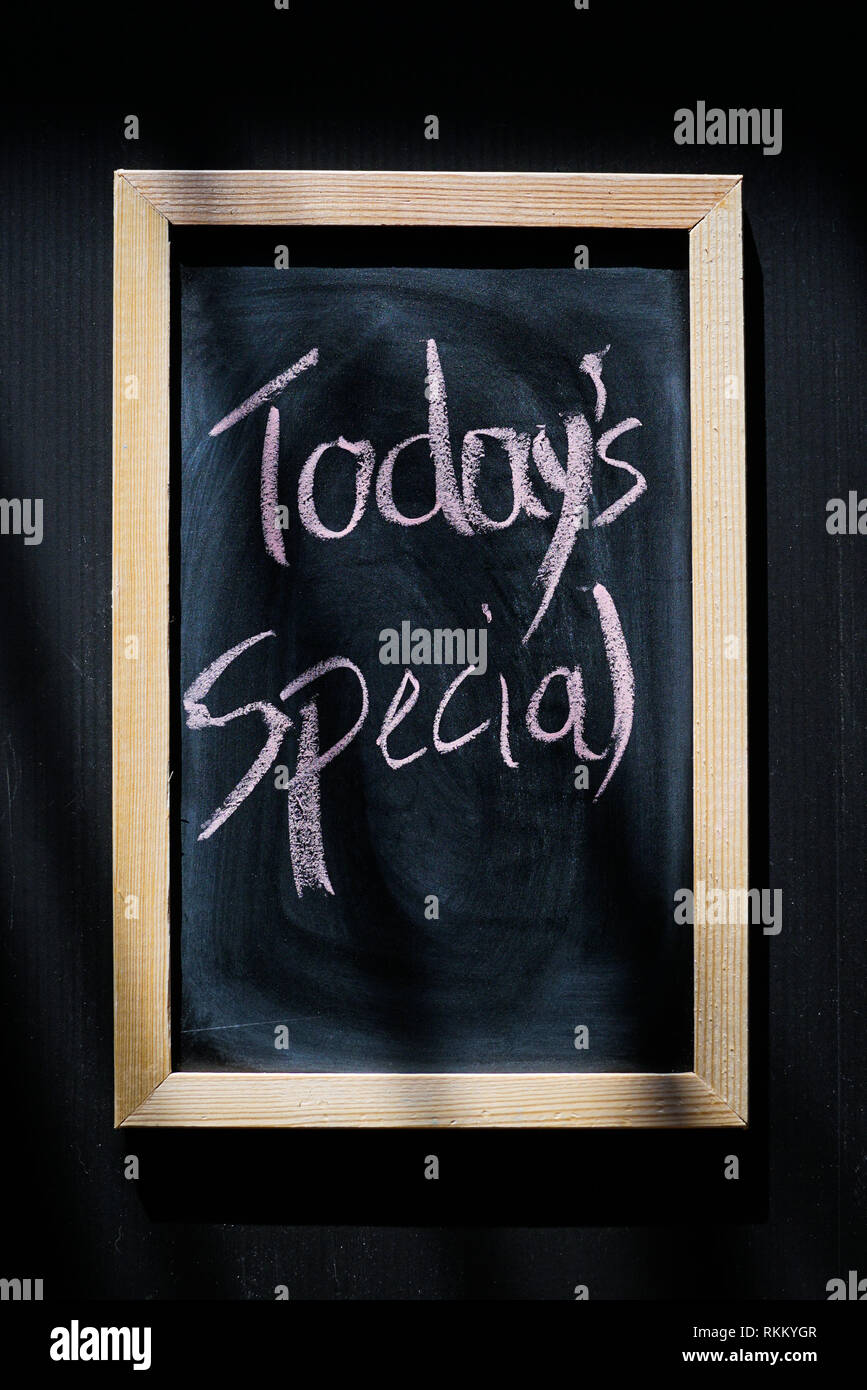 Today's special written with chalk on black board Stock Photo - Alamy