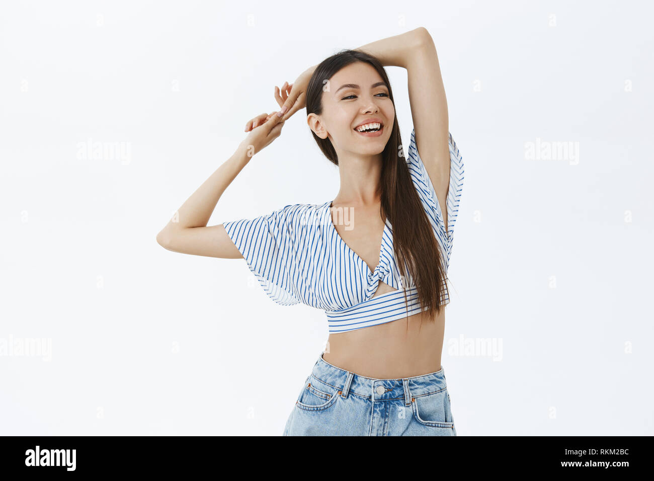 Charming delighted and relaxed carefree asian woman with long dark ...