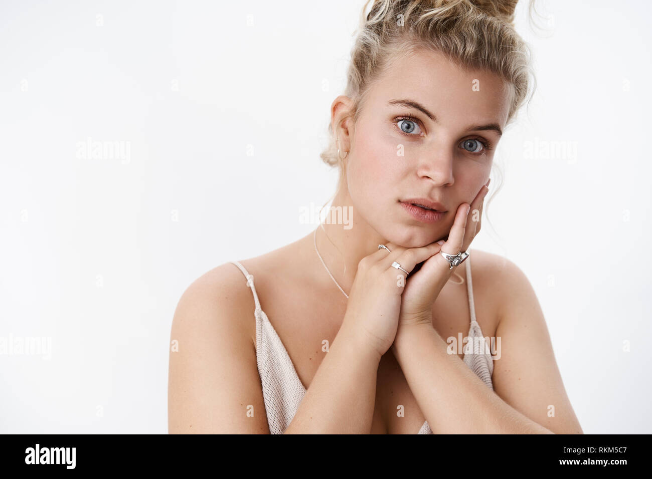 Portrait Of Tender And Feminine Lovely European Female With Blond Hair