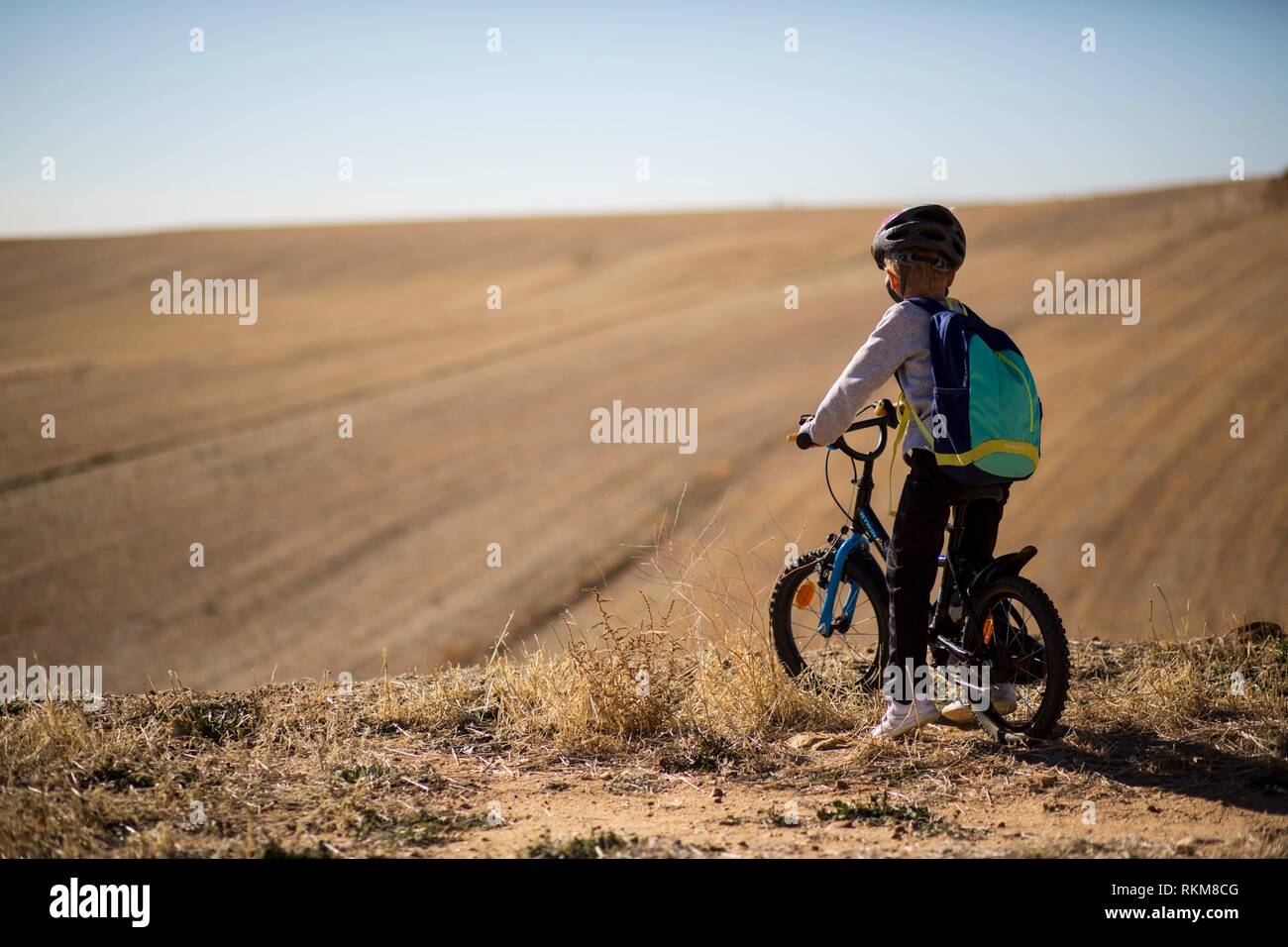 Boy riding his bicycle hi-res stock photography and images - Alamy