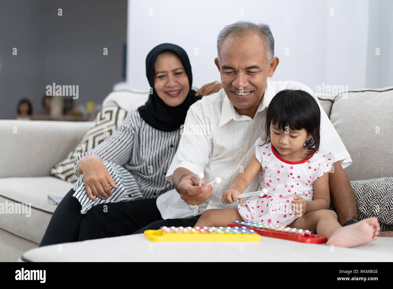 happy asian grandparent having fun with grandchild Stock Photo - Alamy
