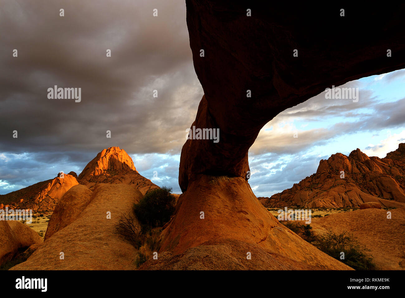 Natural rock arch near the granite mountain Spitzkoppe at sunset, Namibia, Africa Stock Photo ...