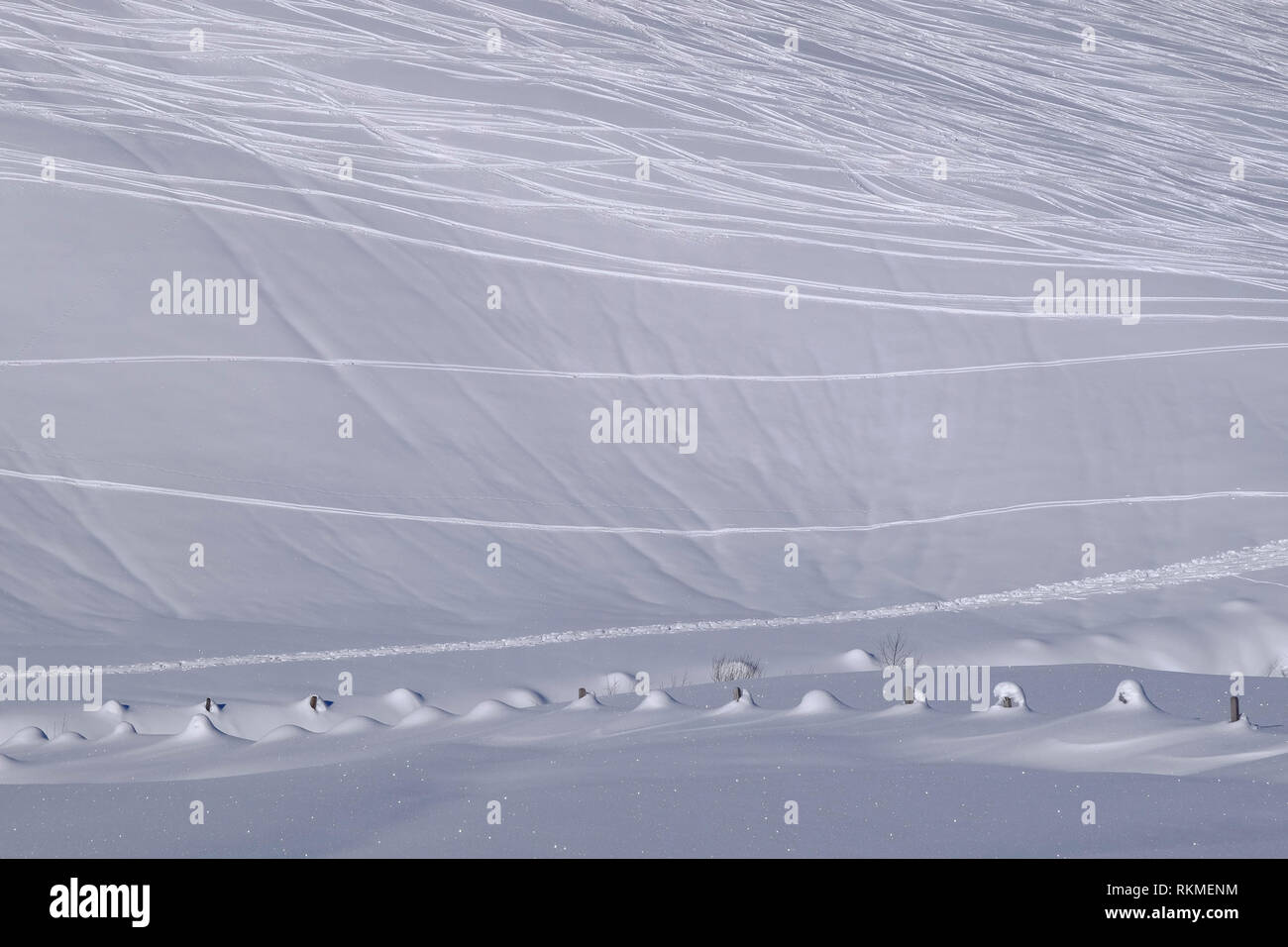 Ski traces in the snow, Austrian Alps Stock Photo - Alamy
