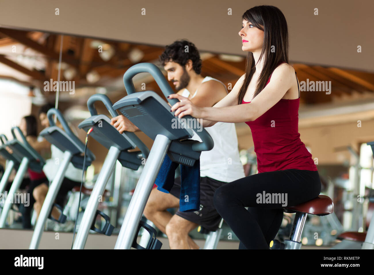 Group of people doing fitness in a gym Stock Photo - Alamy