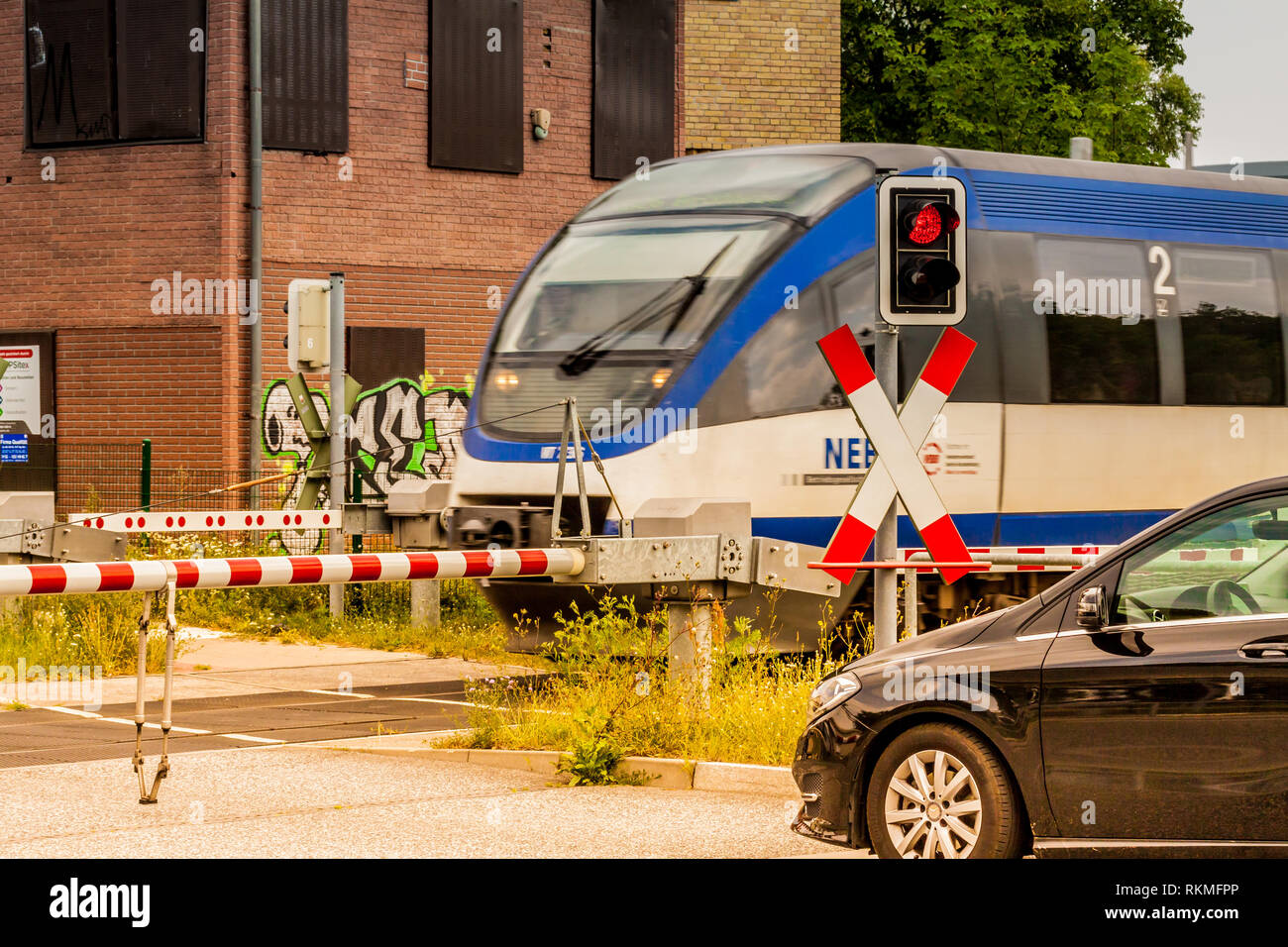 Railroad crossing with gates High Resolution Stock Photography and ...