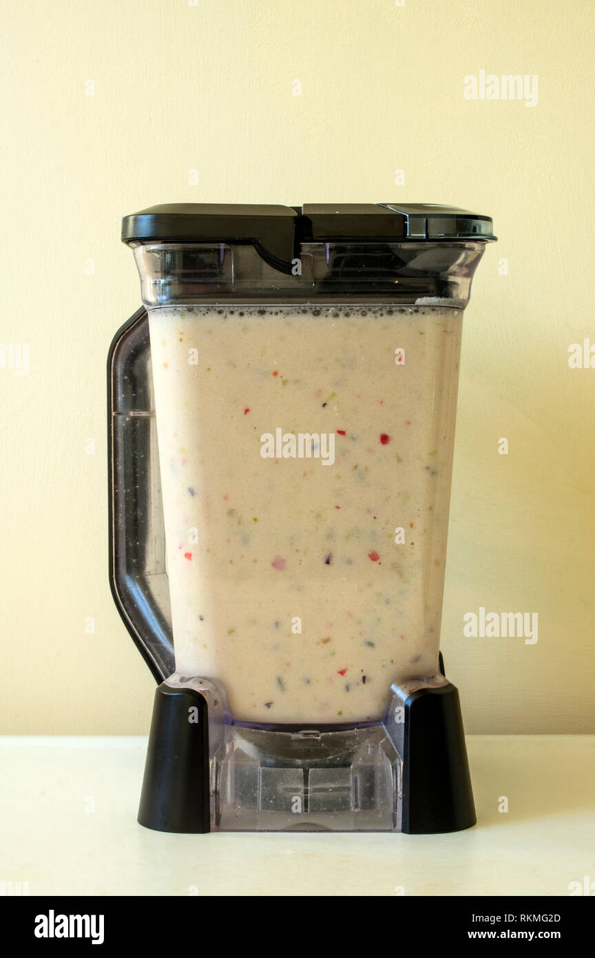 Completed drink having been pureed in a food processor Stock Photo - Alamy
