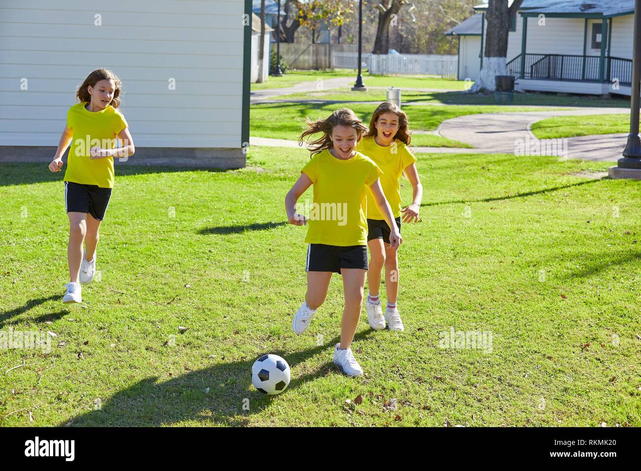Teens playing football hi-res stock photography and images - Alamy