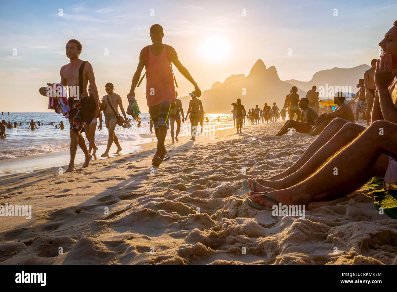 Two men talking beach hi-res stock photography and images - Alamy