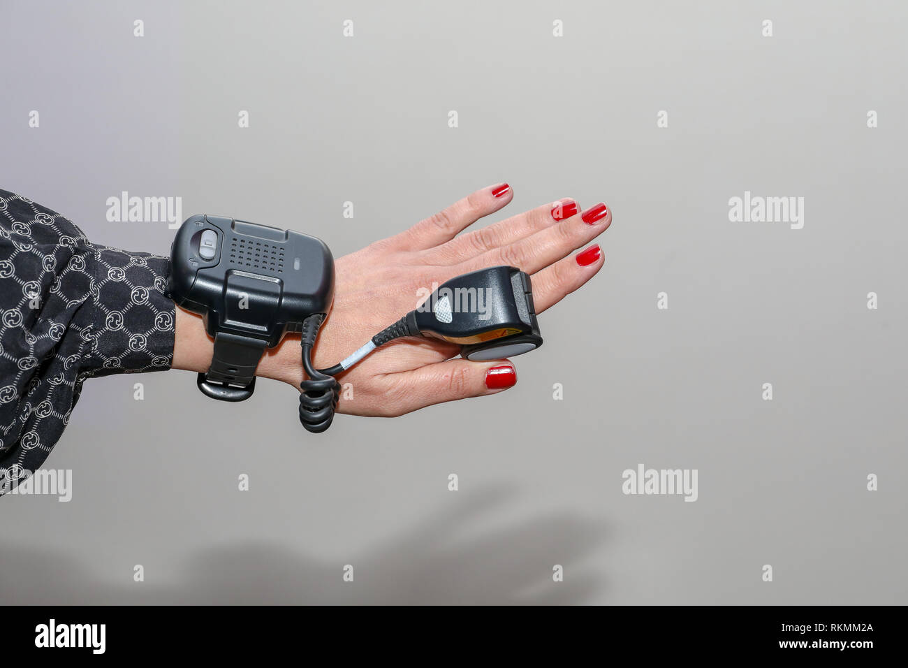 Ring Barcode Scanner for Fast Picking at Woman Hand Stock Photo - Alamy