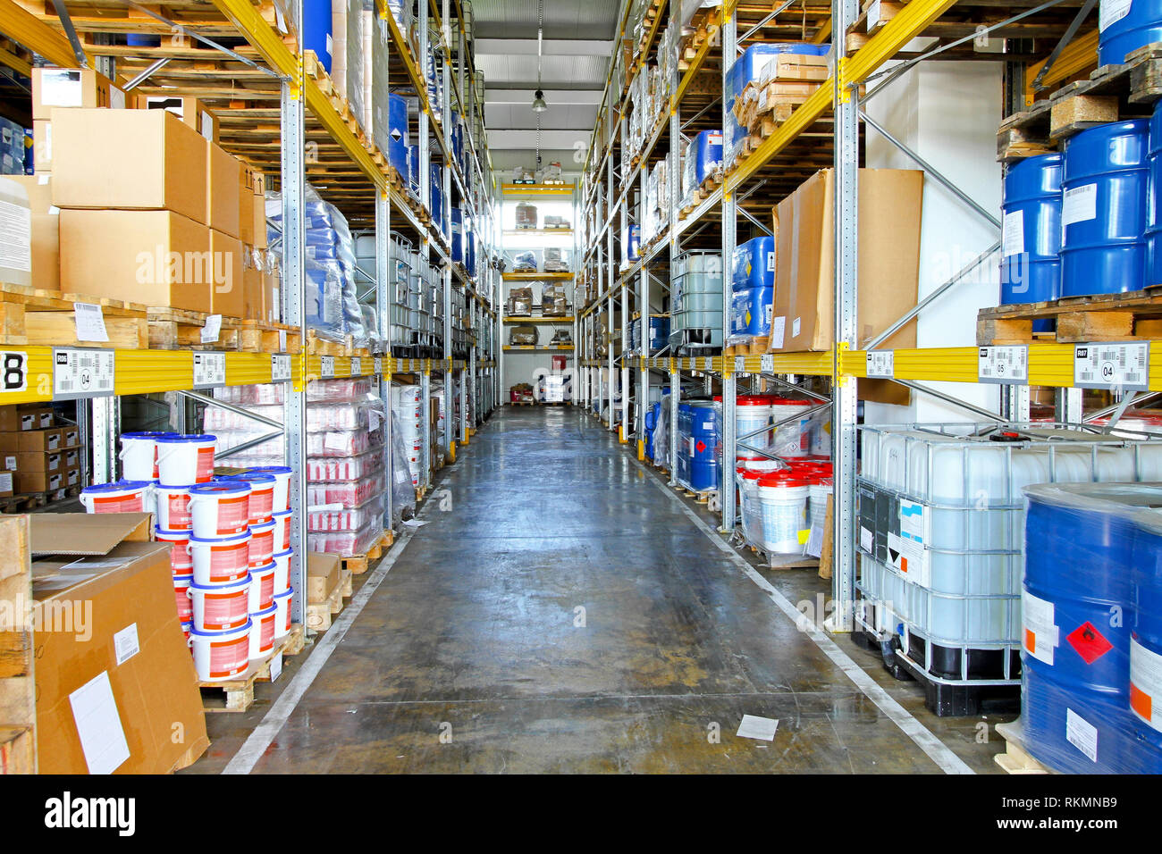 Storehouse corridor with goods and supplies at shelves Stock Photo - Alamy