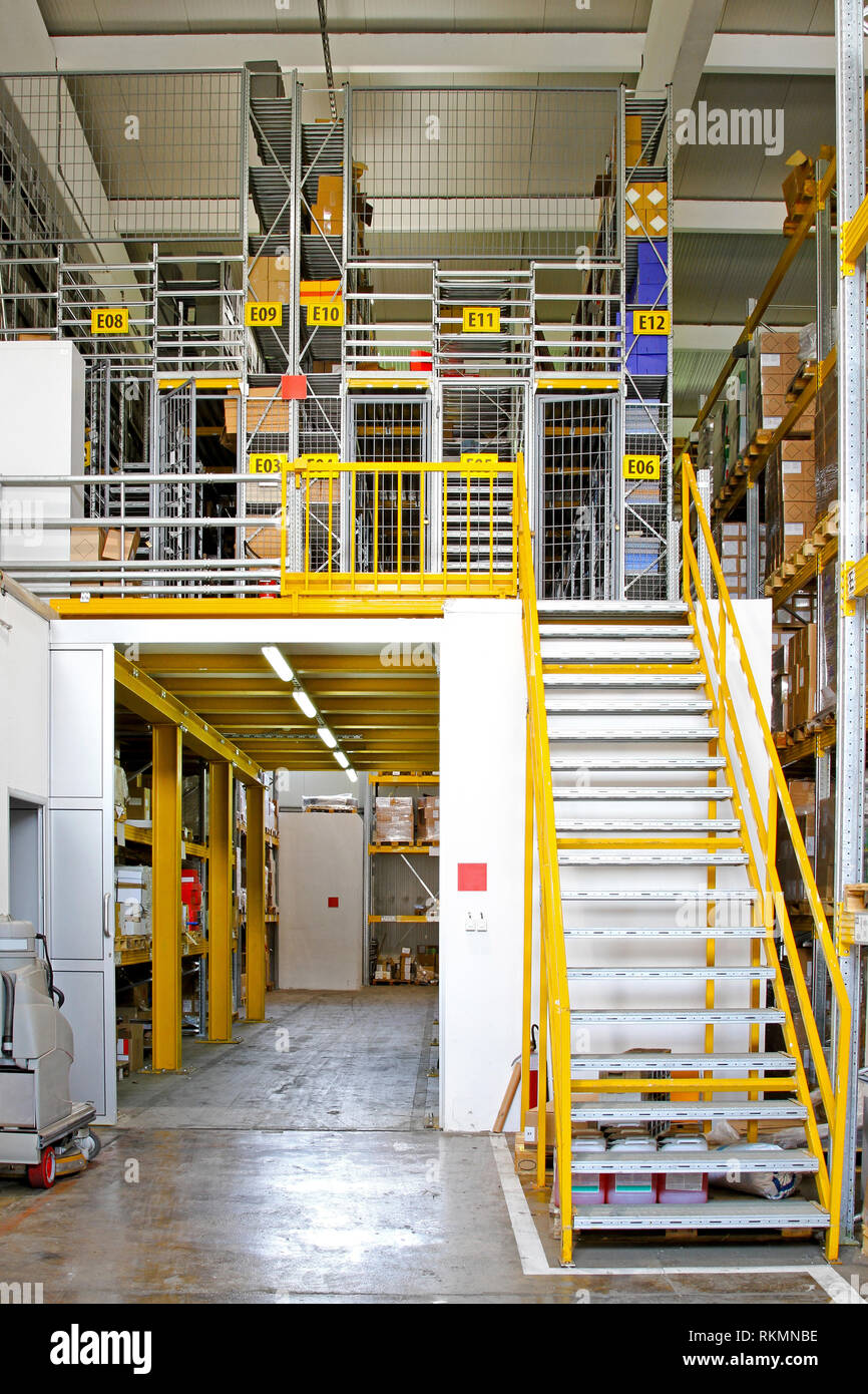Warehouse interior with safety cage rooms Stock Photo - Alamy