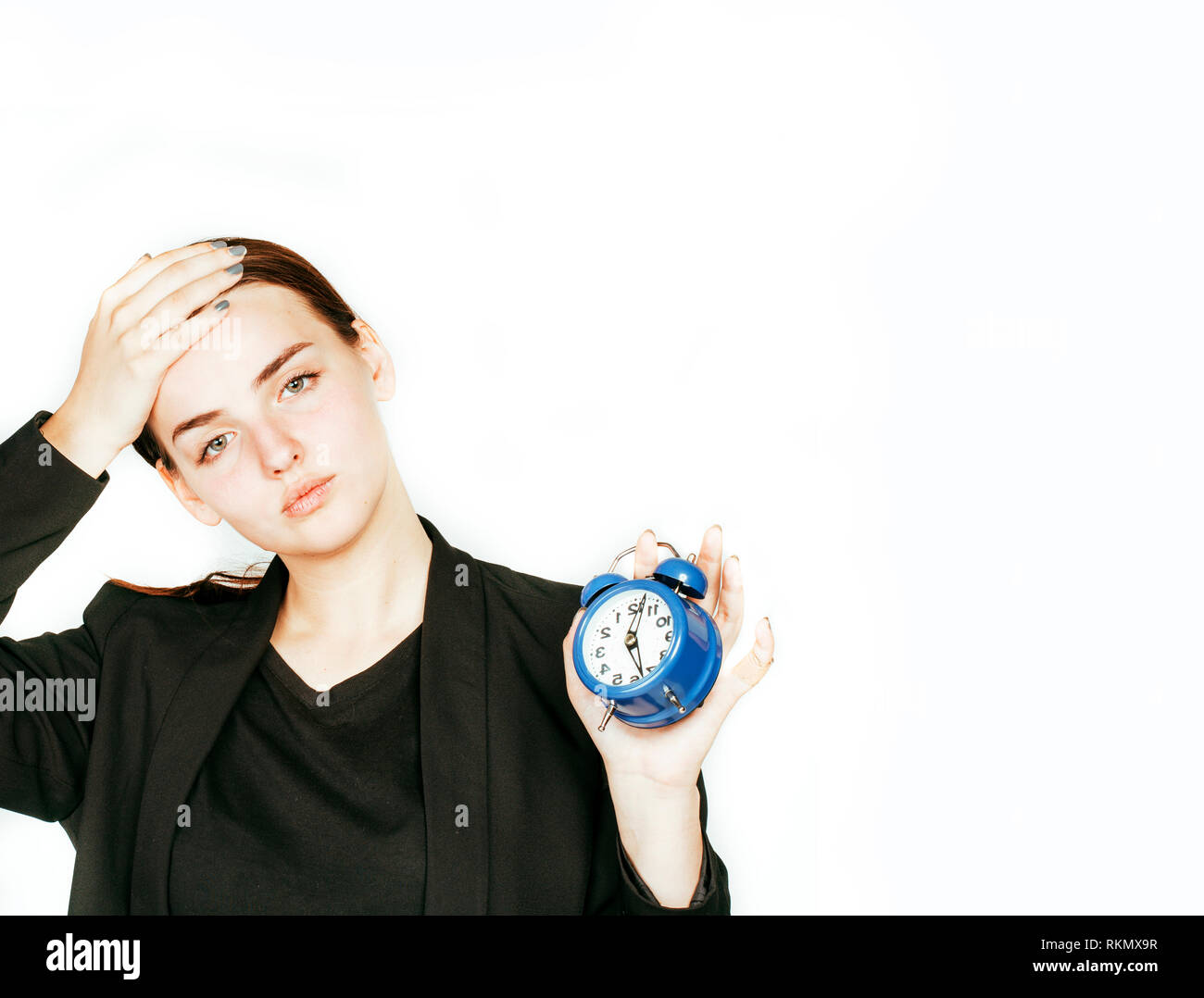 young beauty woman in business style costume waking up for work early ...