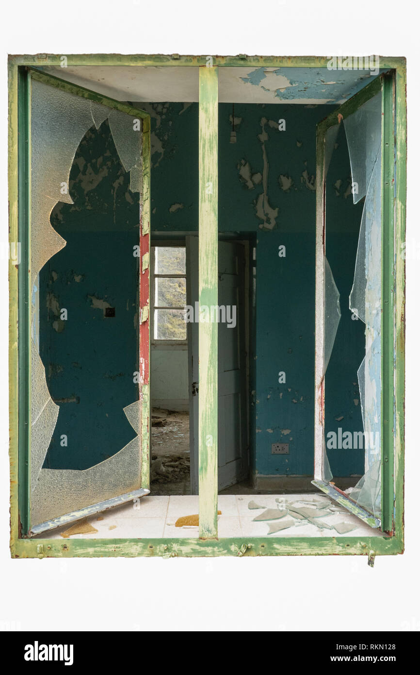 Opened window glass broken to an abandon building isolated on white ...