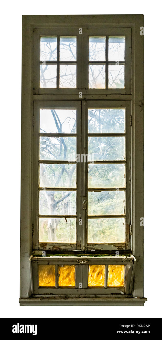 Large vintage window of an abandoned building, spooky forest can be ...