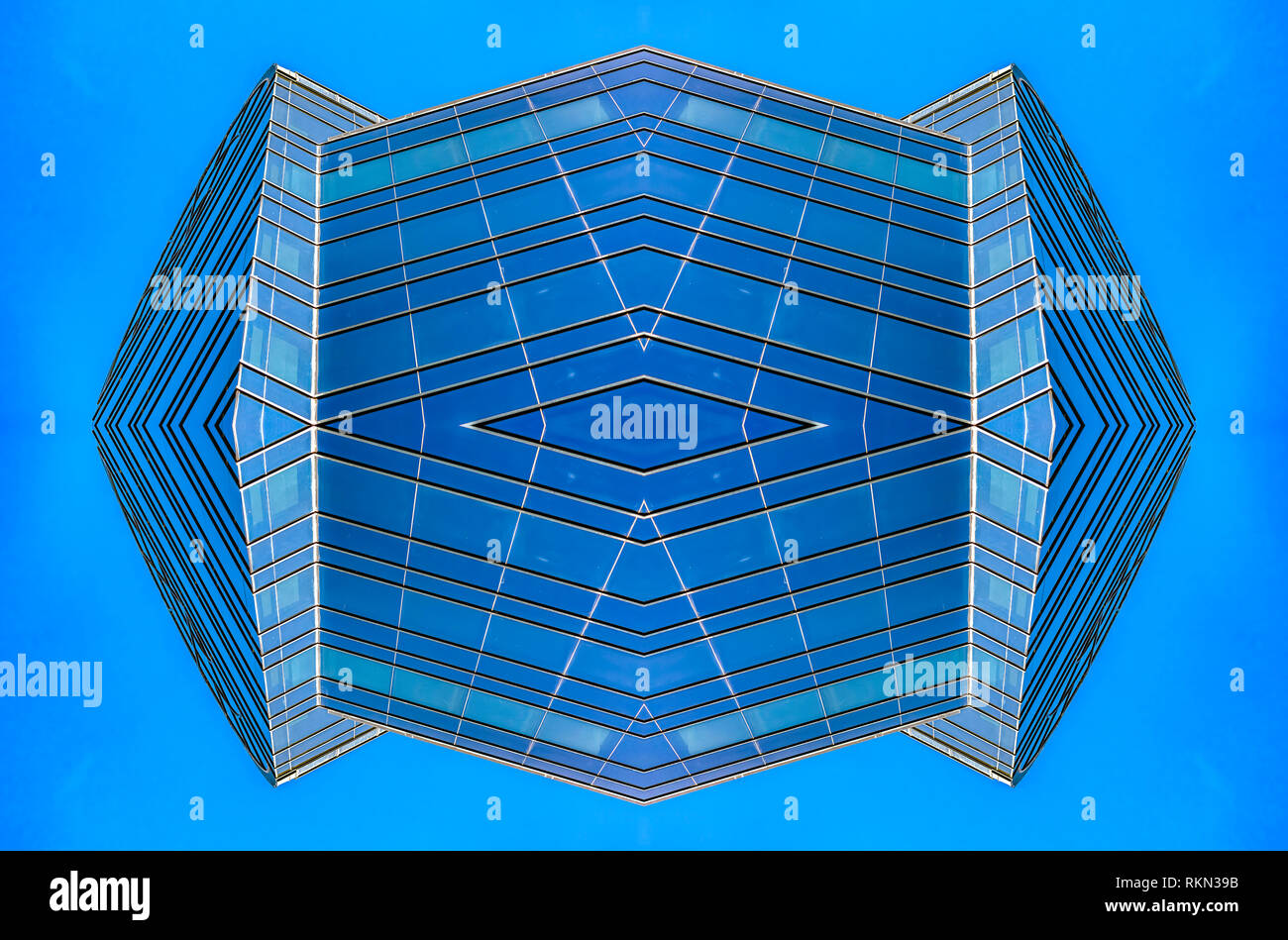 Abstract blue glass building in downtown grid. Geometric kaleidoscope ...
