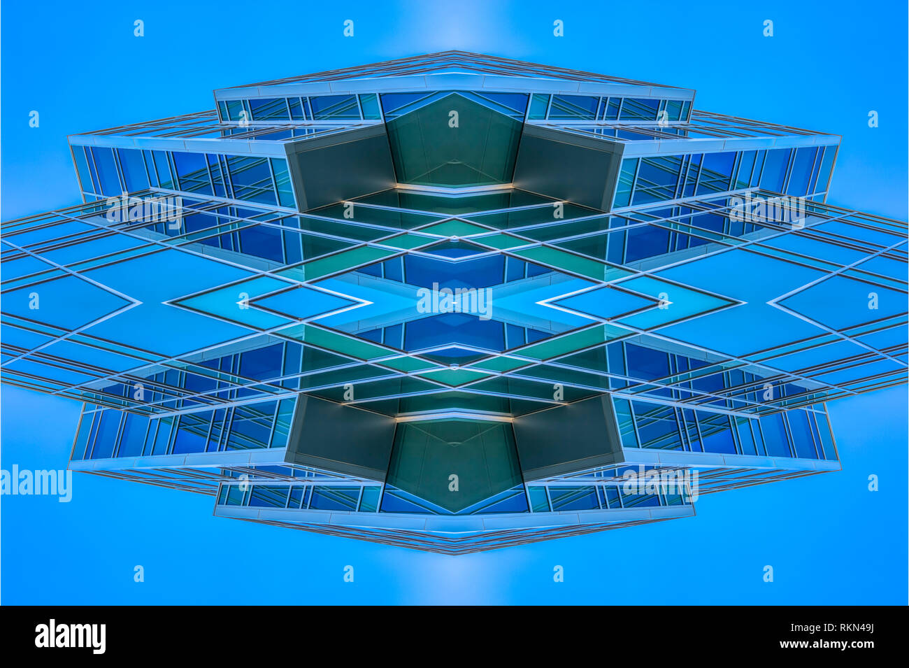 Angular building looking abstract with sky reflect. Geometric ...