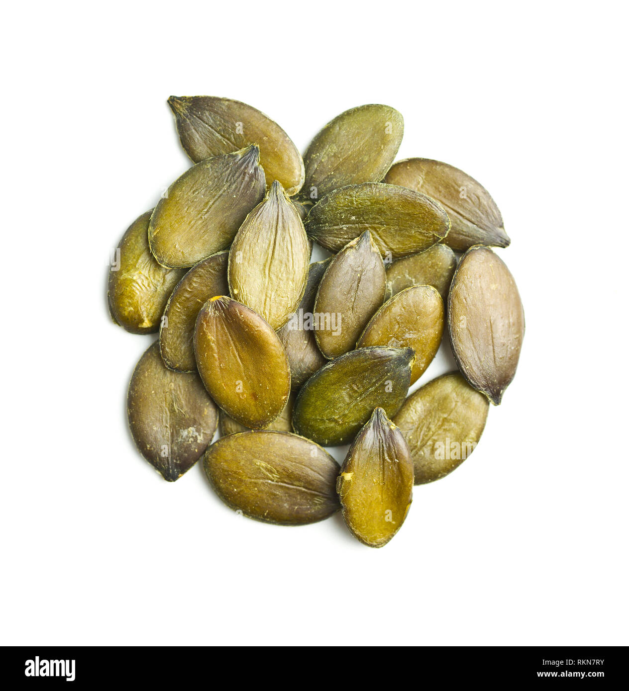 Peeled pumpkin seeds isolated on white background Stock Photo - Alamy