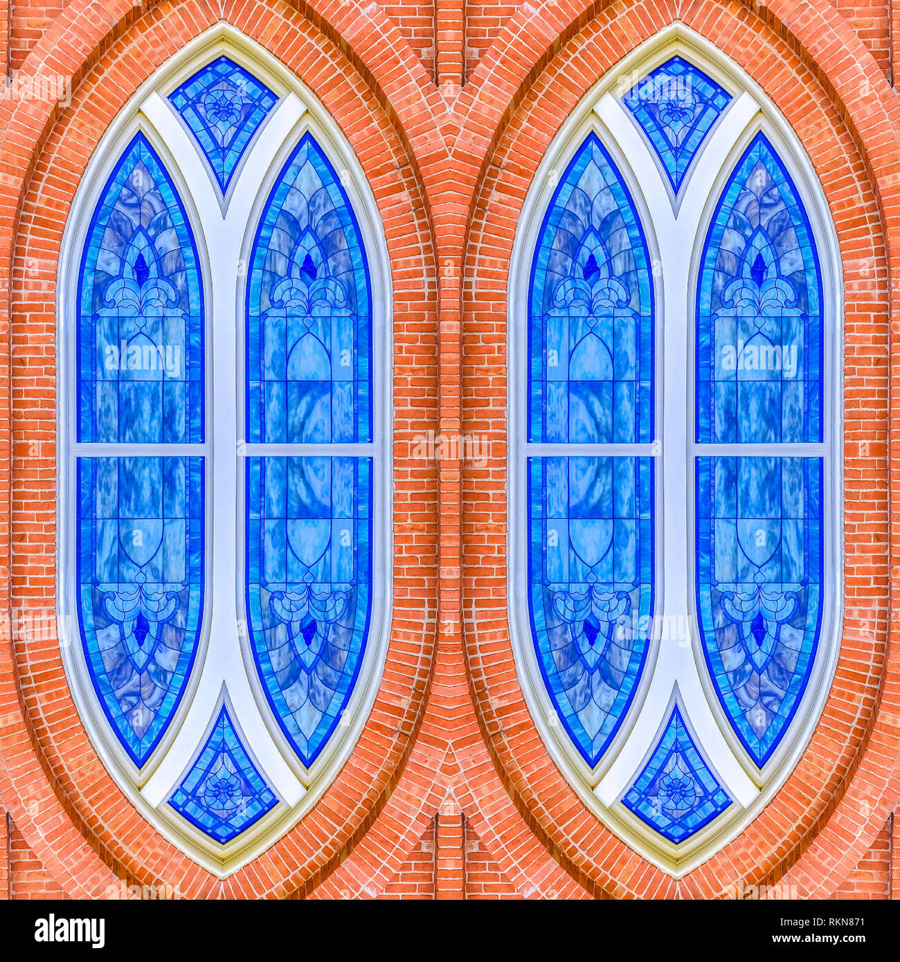 Reflection of stainless steel windows on church. Geometric kaleidoscope ...