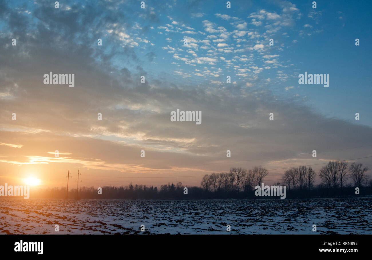 Field snow sunset hi-res stock photography and images - Alamy