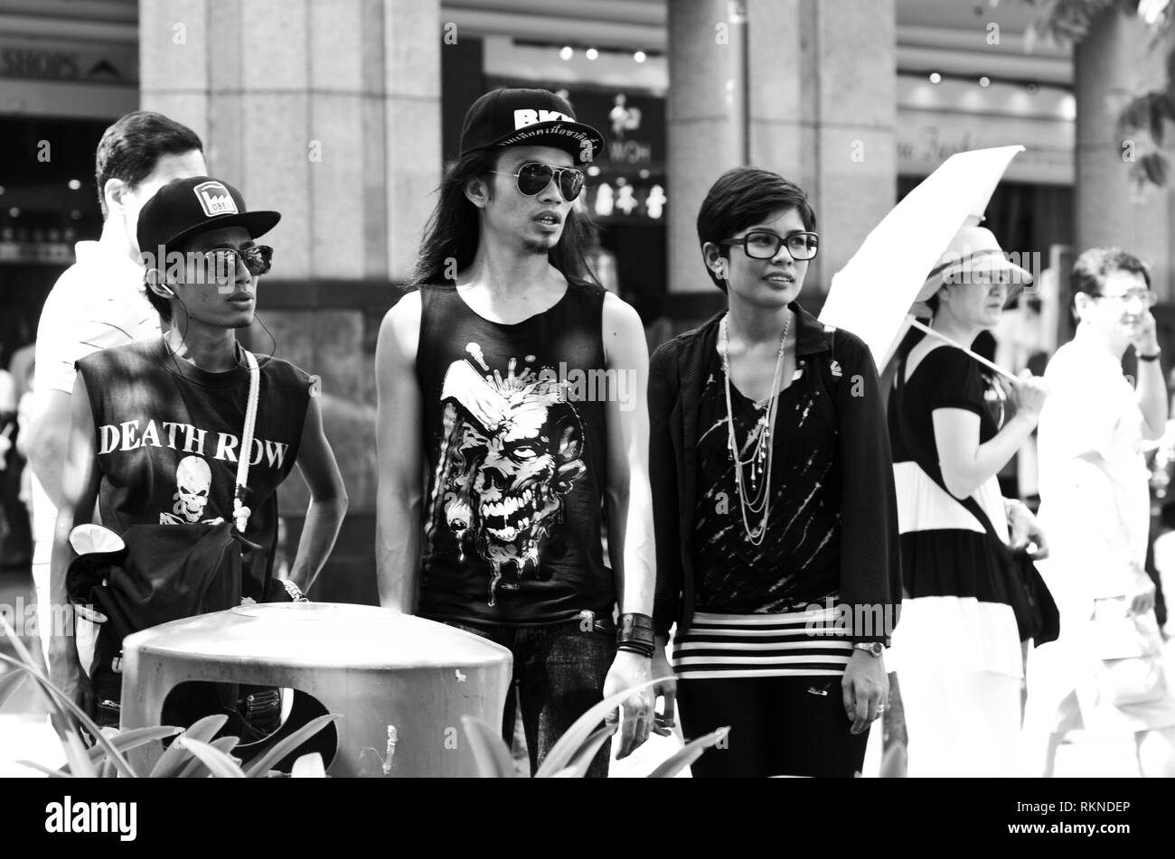 Capturing a moment of People watching a Street Performance Stock Photo ...