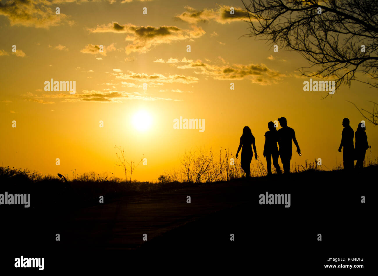 People and Sunset Stock Photo - Alamy