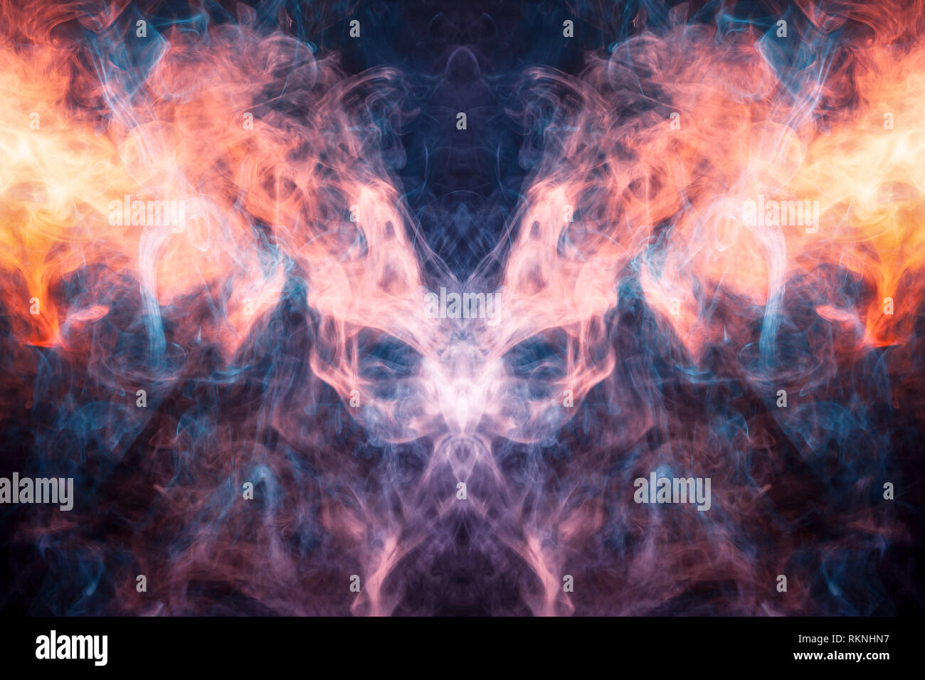 Thick colorful smoke of red and green in the form of a skull, monster ...