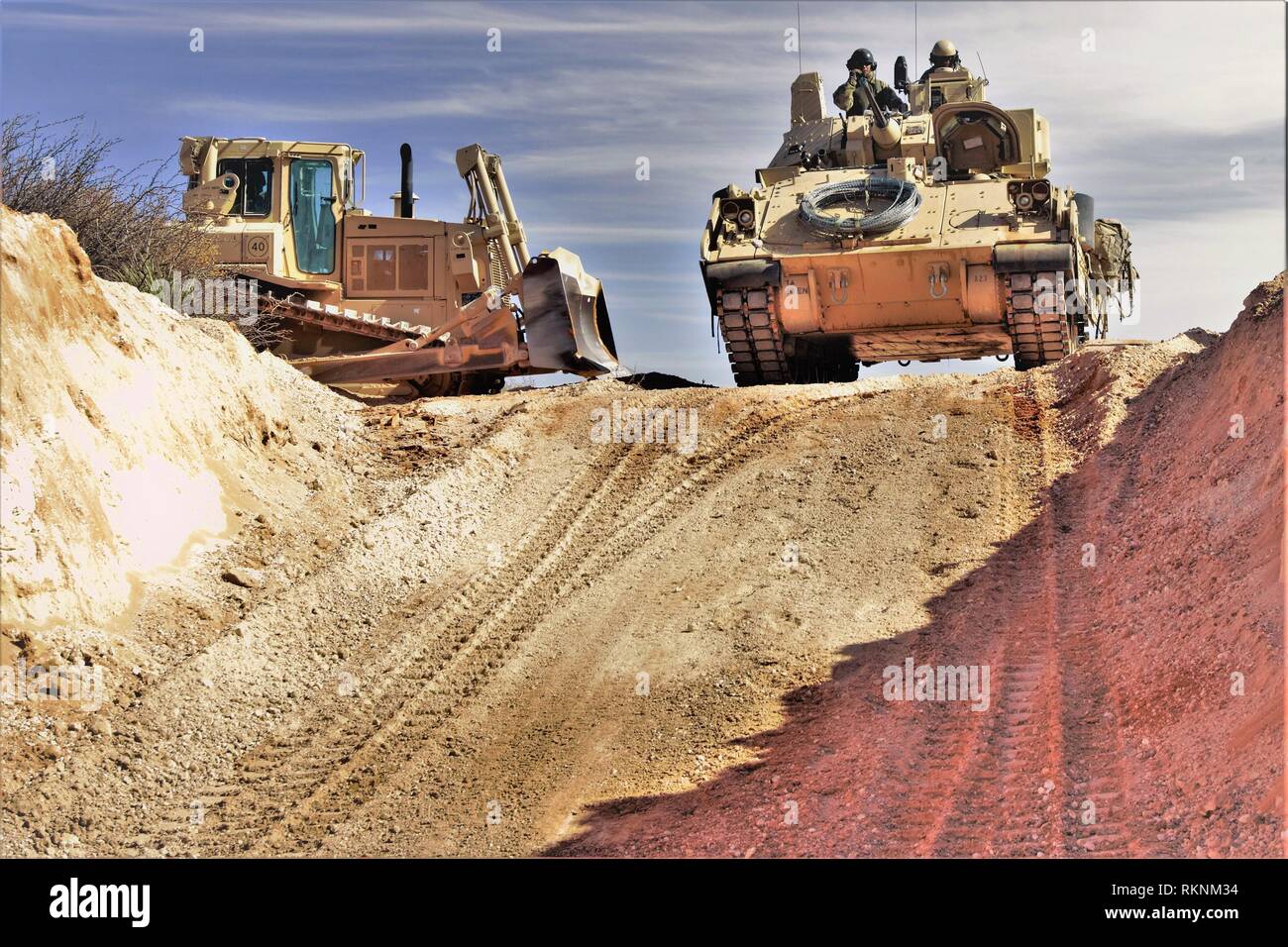 After the armored bulldozers digs enough into the earth, a test must be ...