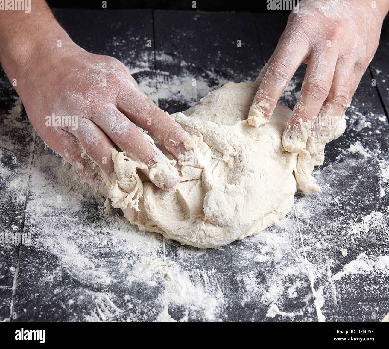 Top view baker kneading dough hi-res stock photography and images - Alamy