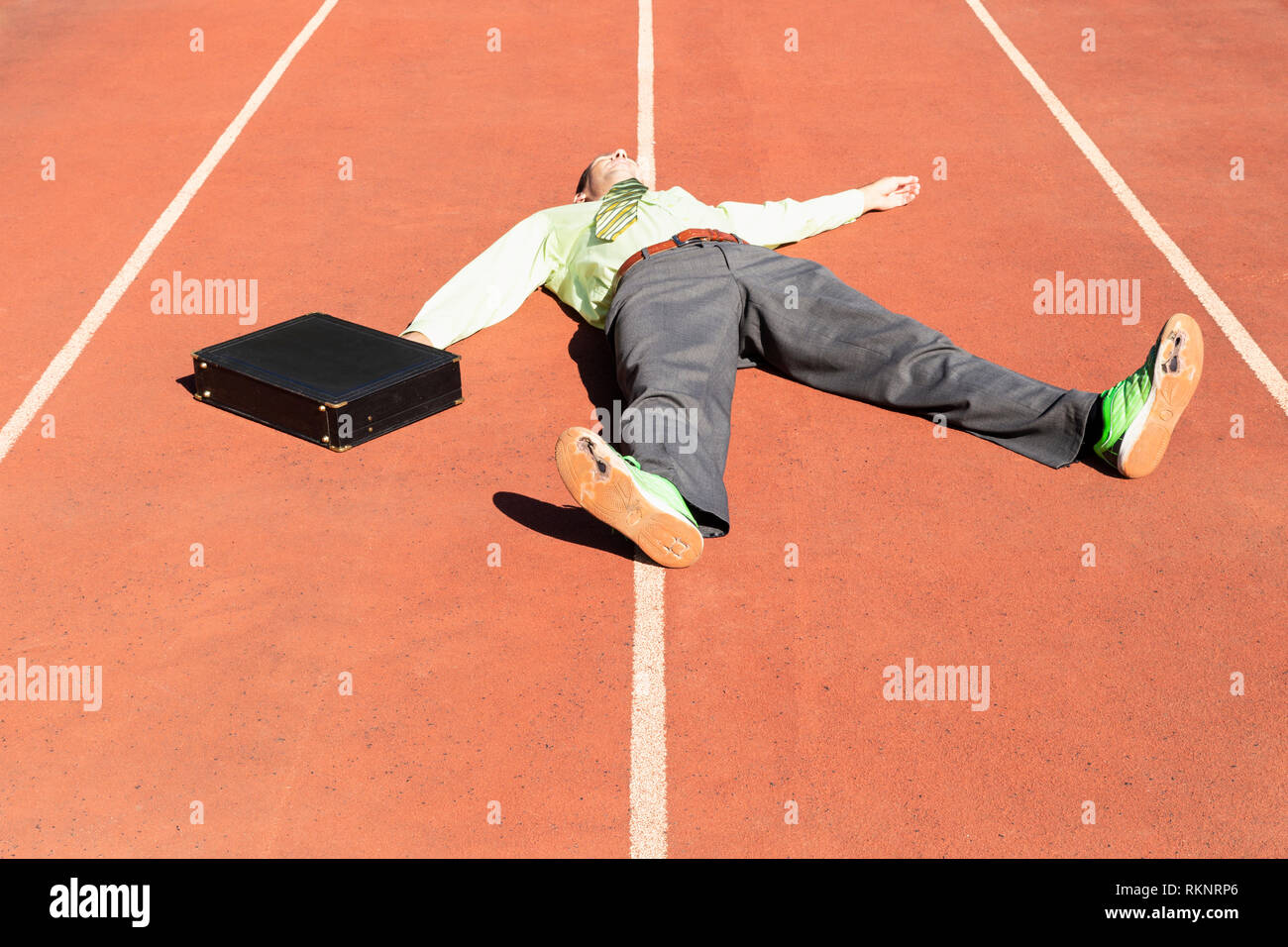Man running exhausted hi-res stock photography and images - Alamy