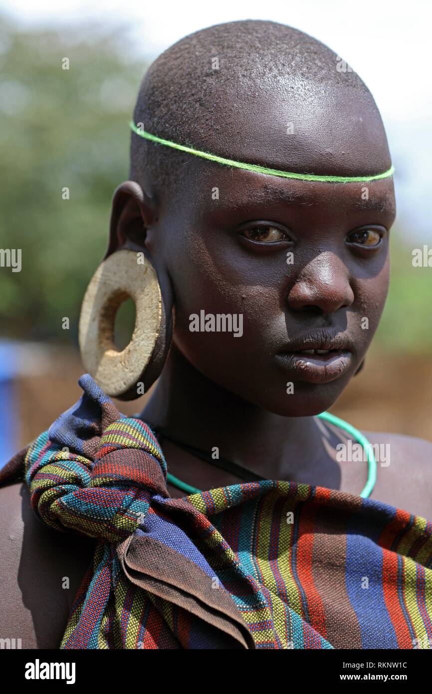 Mursi ear hi-res stock photography and images - Alamy