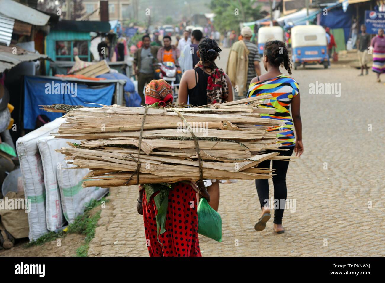 Woman Carrying Firewood Africa High Resolution Stock Photography and ...