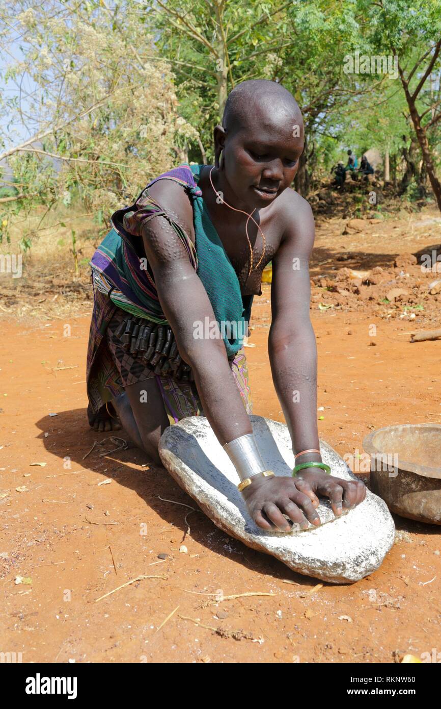 Woman working on grinding stone hi-res stock photography and images - Alamy