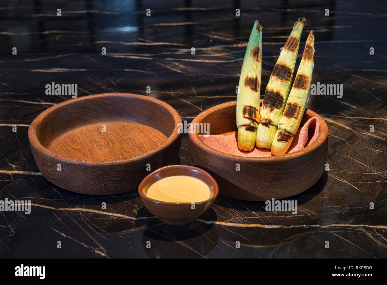 Sweet corn at Michelin-starred Gaa restaurant, Bangkok, Thailand Stock ...