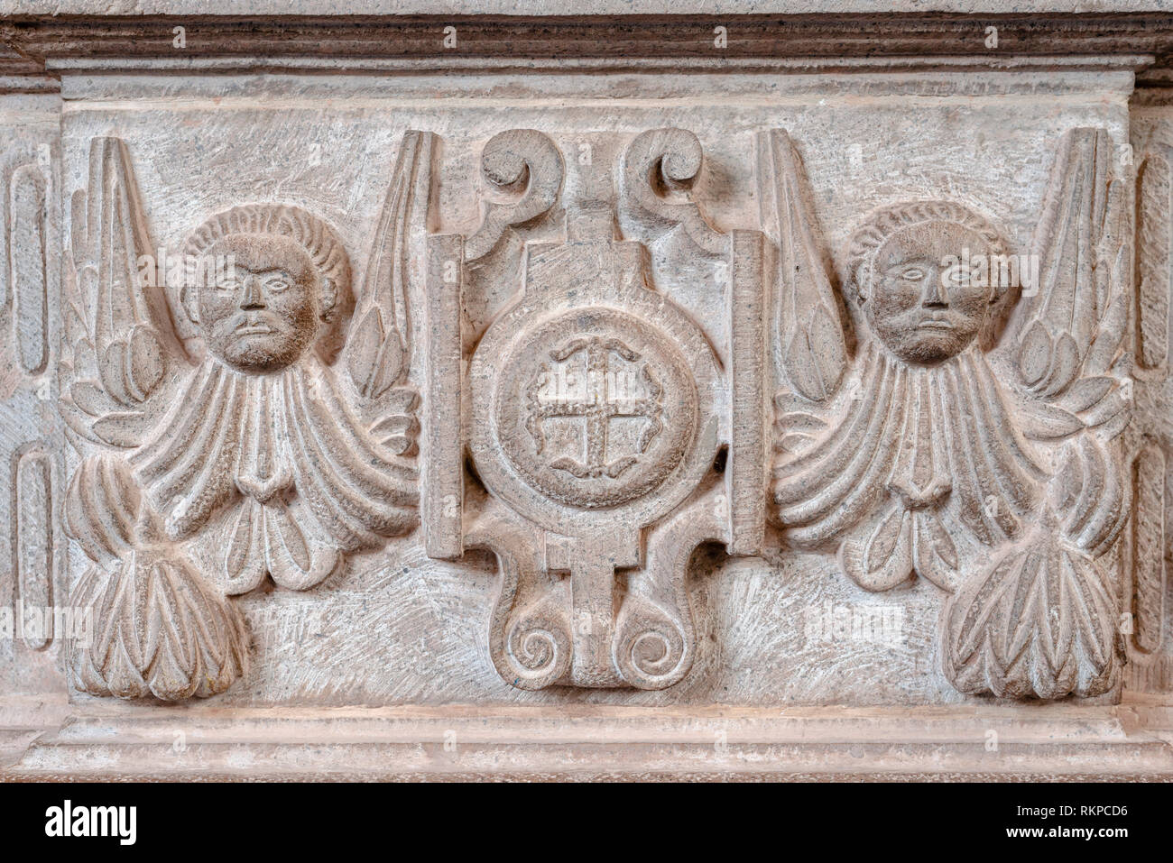ancient stone relief with Catholic cross symbol from famous Santo ...