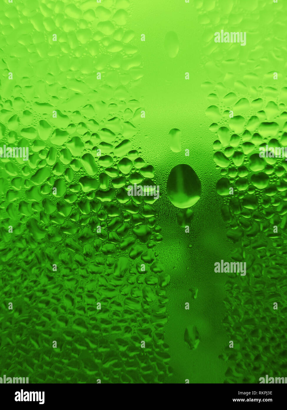 natural water drops on green glass texture Stock Photo - Alamy