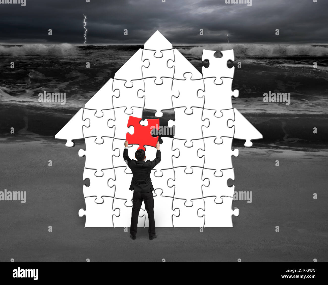Put Red Puzzle Into House Shape For Bad Situation In Front Stock Photo put-red-puzzle-into-house-shape-for-bad-situation-in-front-stock-photo