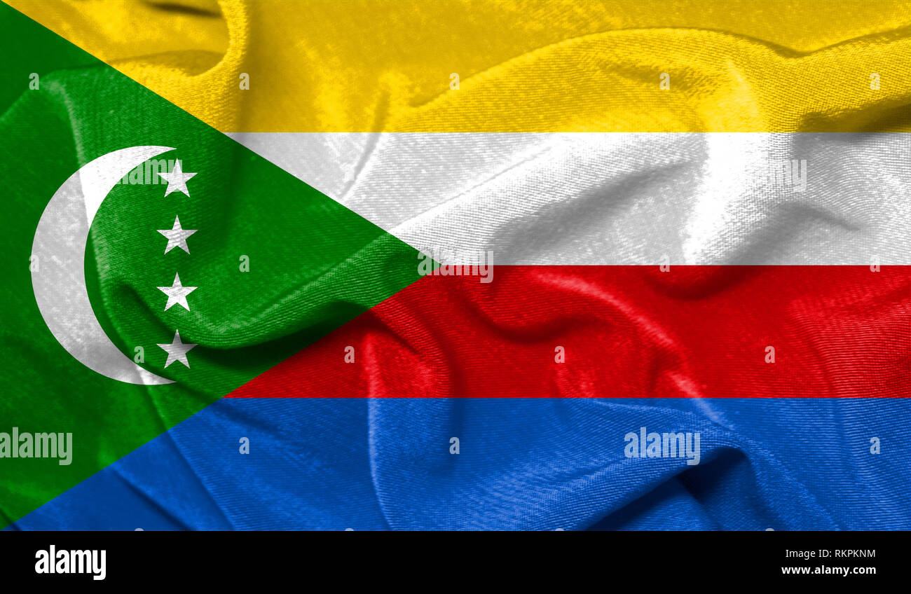 Realistic flag of Comoros on the wavy surface of fabric Stock Photo - Alamy