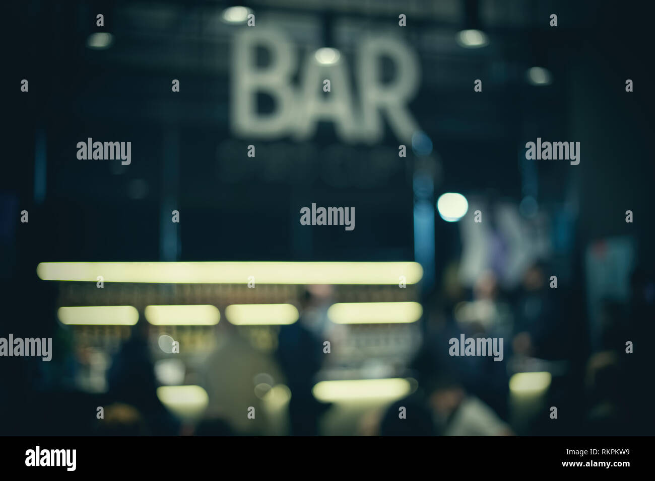 Blurry party background. Defocused glowing bar counter Stock Photo - Alamy