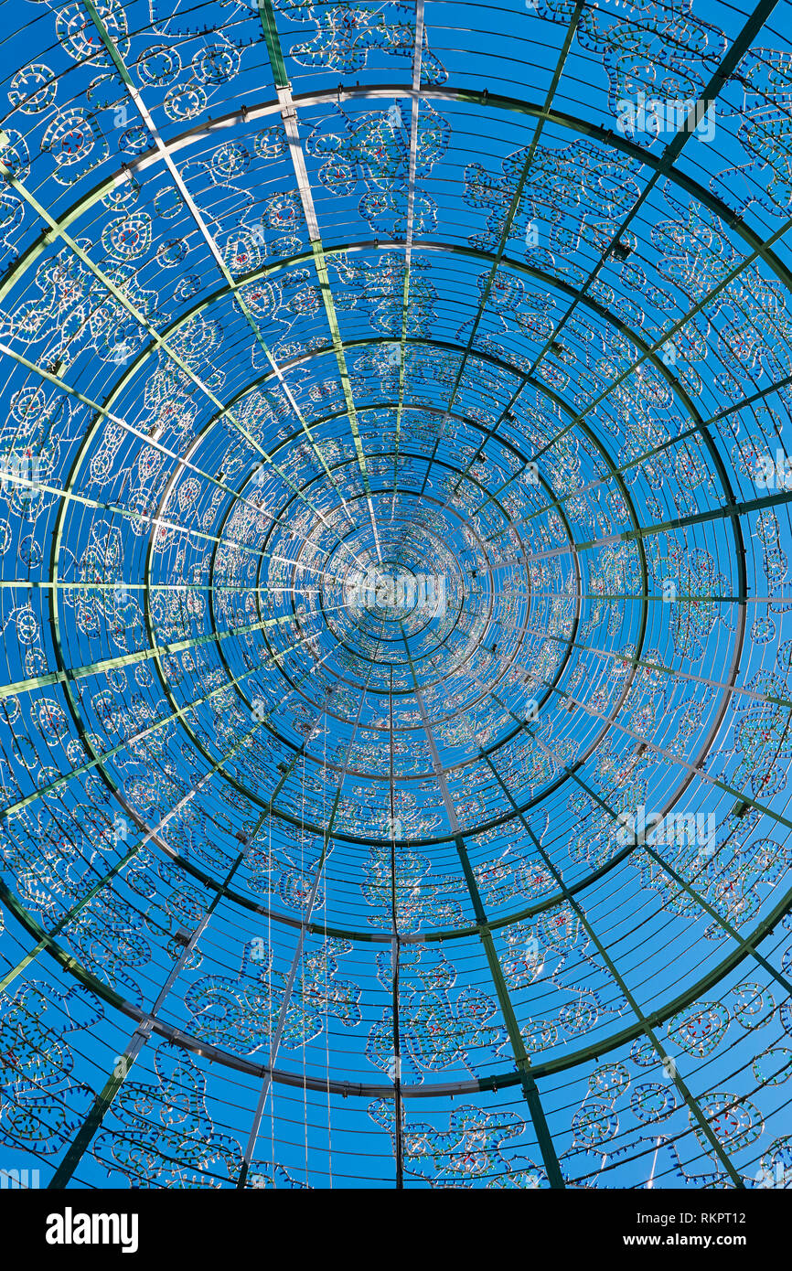 Huge christmas tree from above under a blue sky. Vertical Stock Photo ...