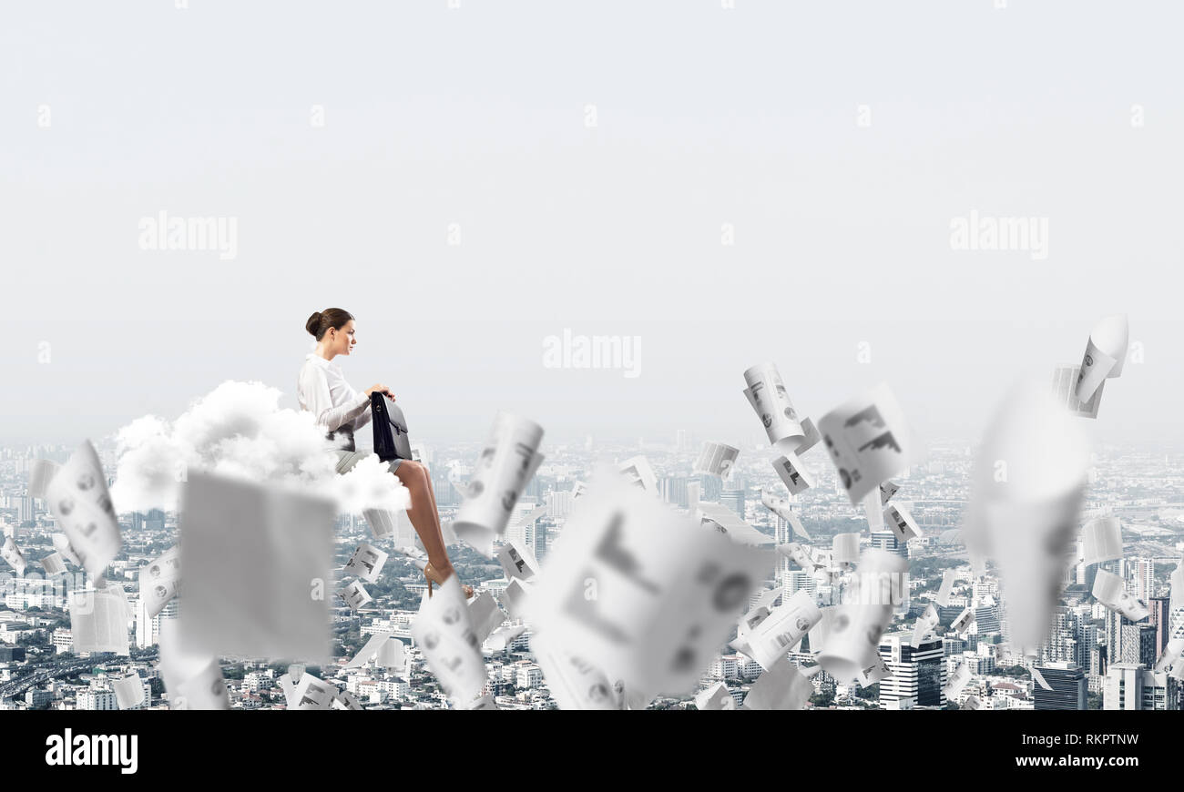 Woman float above city on cloud and papers flying around Stock Photo ...
