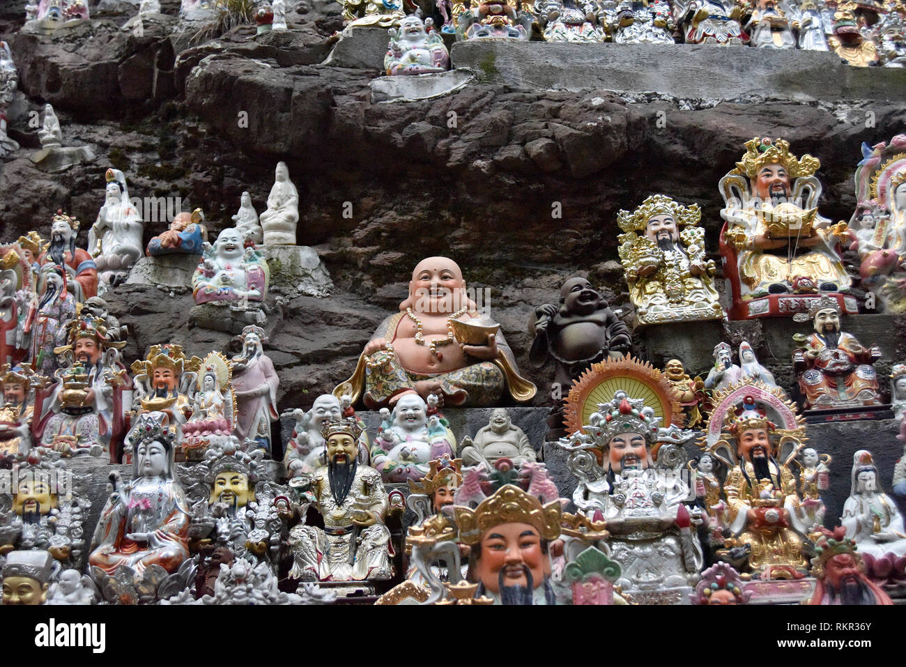 Figures and statues of buddha and gods near the temple in Asia Stock ...