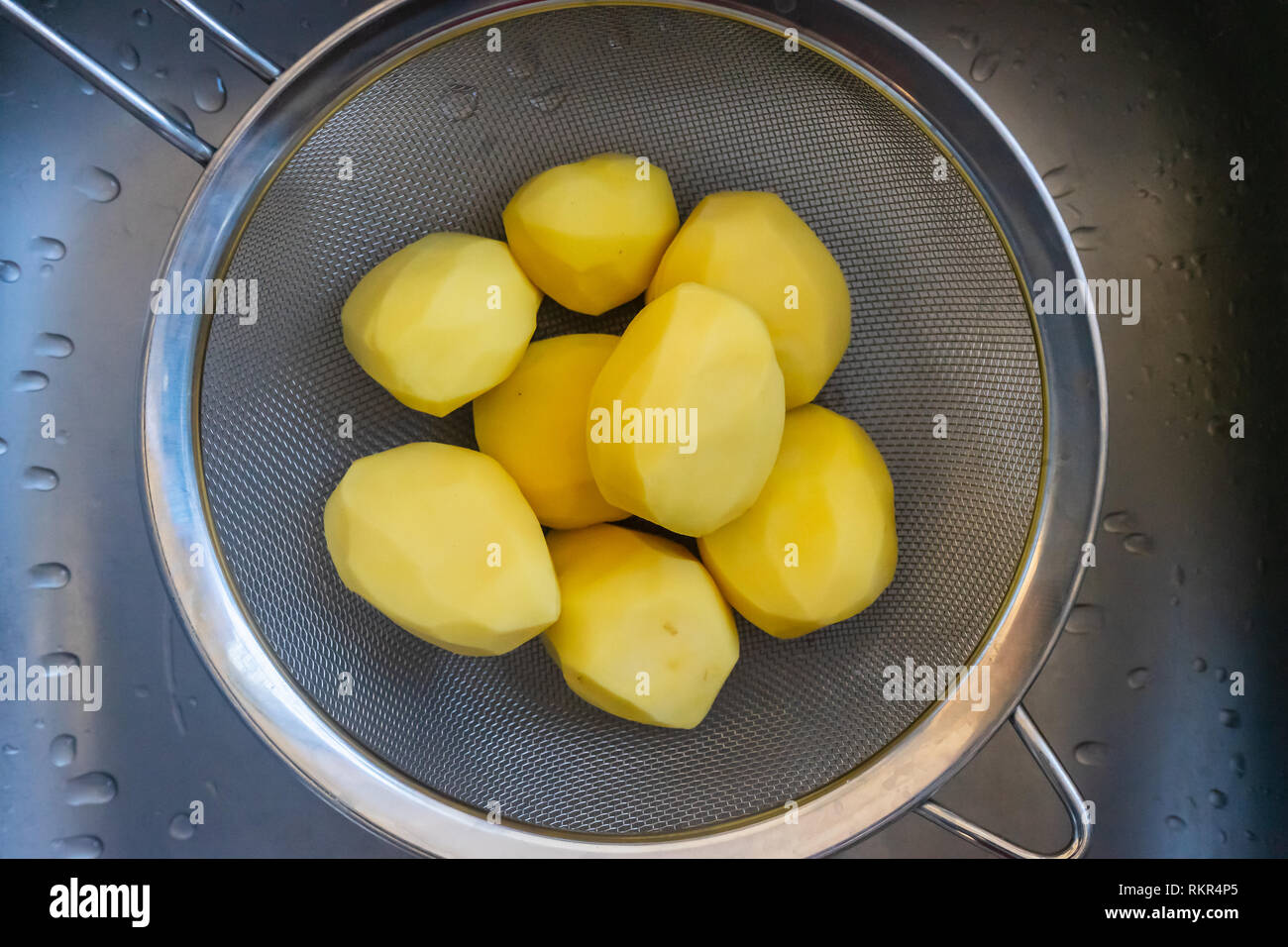 Potato sieve hi-res stock photography and images - Alamy