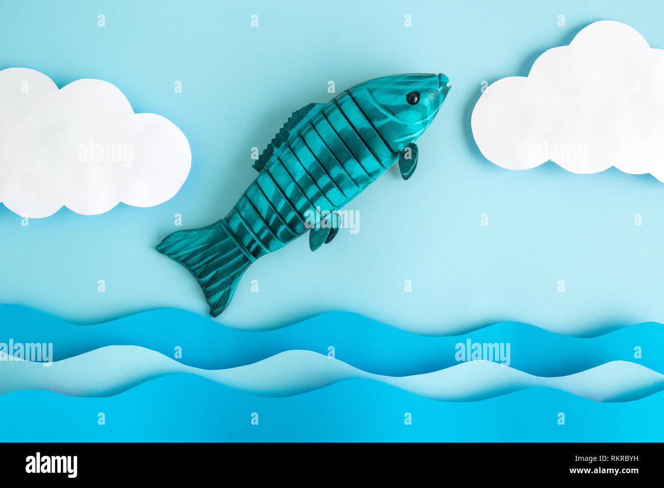 Fish jumping out of sea hi-res stock photography and images - Alamy