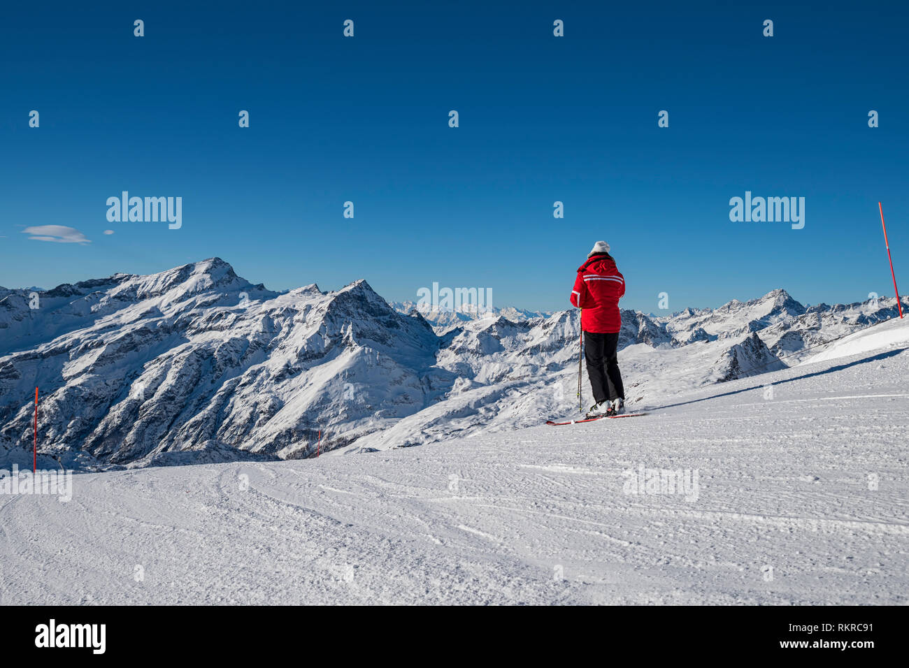 Skier in the alps Stock Photo - Alamy