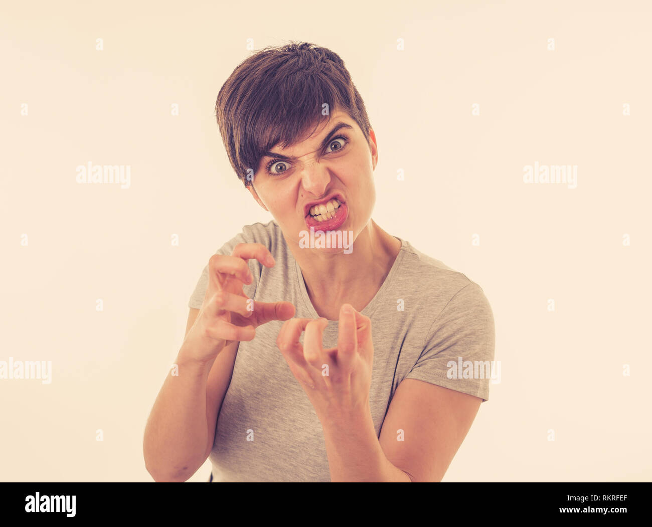 Woman short hair angry hi-res stock photography and images - Alamy