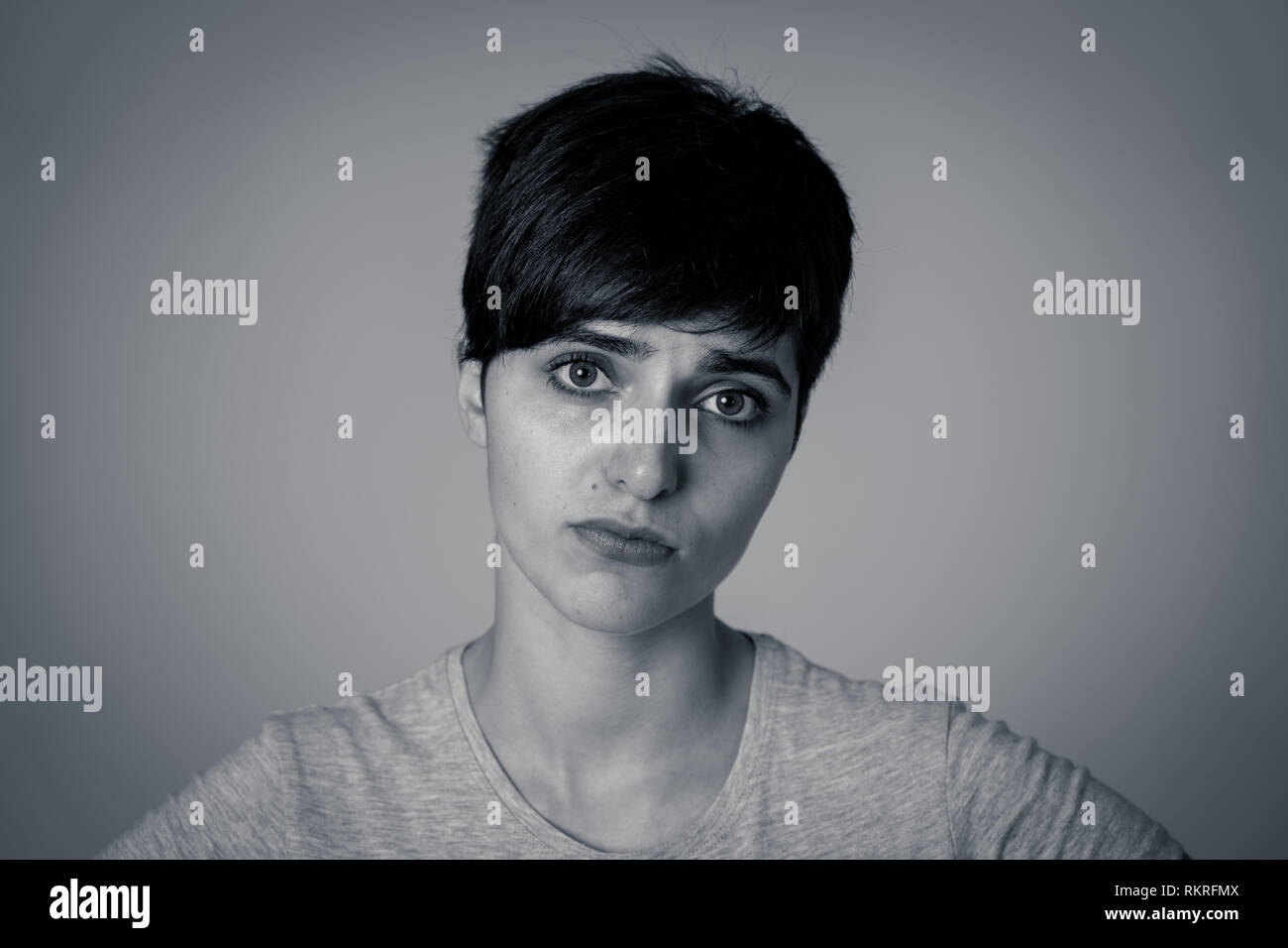 Black and white portrait of beautiful young sad caucasian woman ...