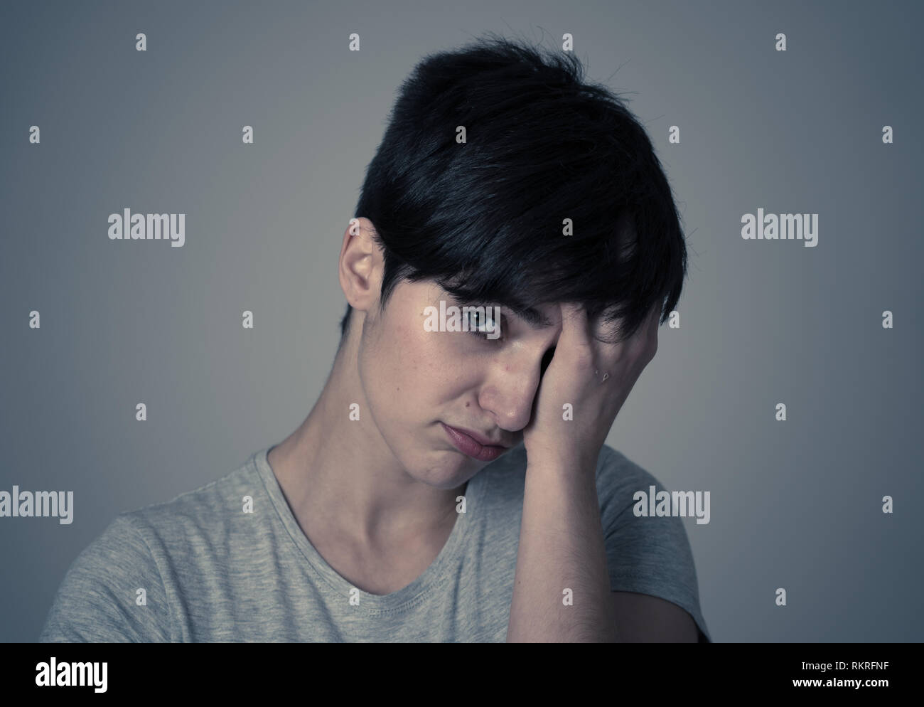 Close Up Portrait Of A Beautiful Young Caucasian Woman With Sad Face