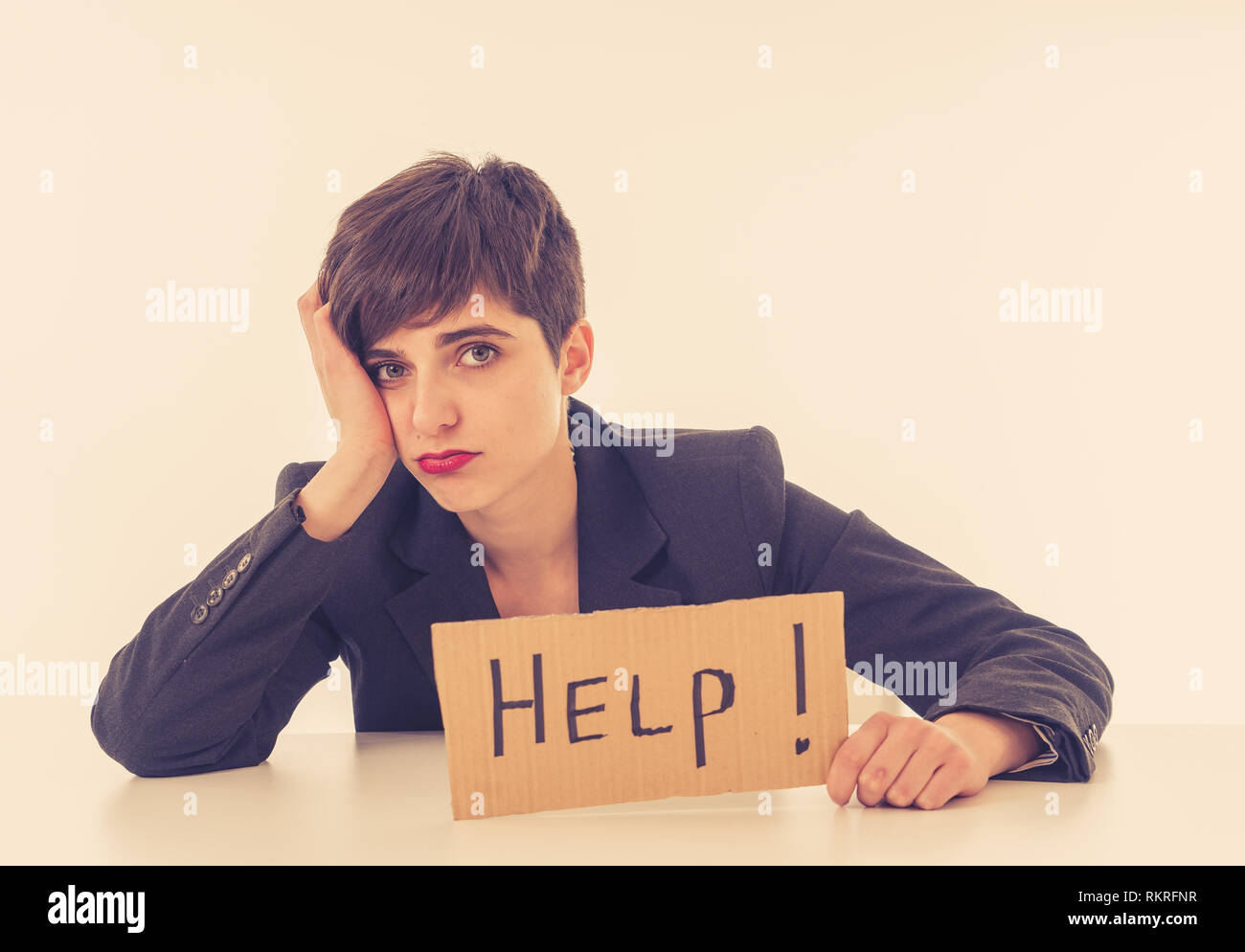 Beautiful business woman feeling overwhelmed and desperate asking for ...