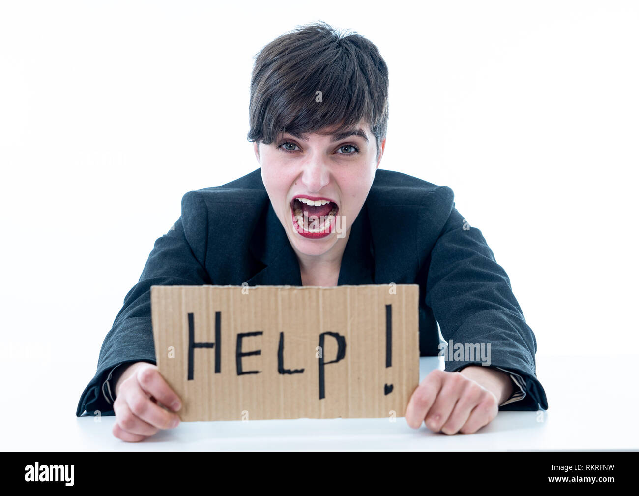 Beautiful business woman feeling overwhelmed and desperate asking for ...